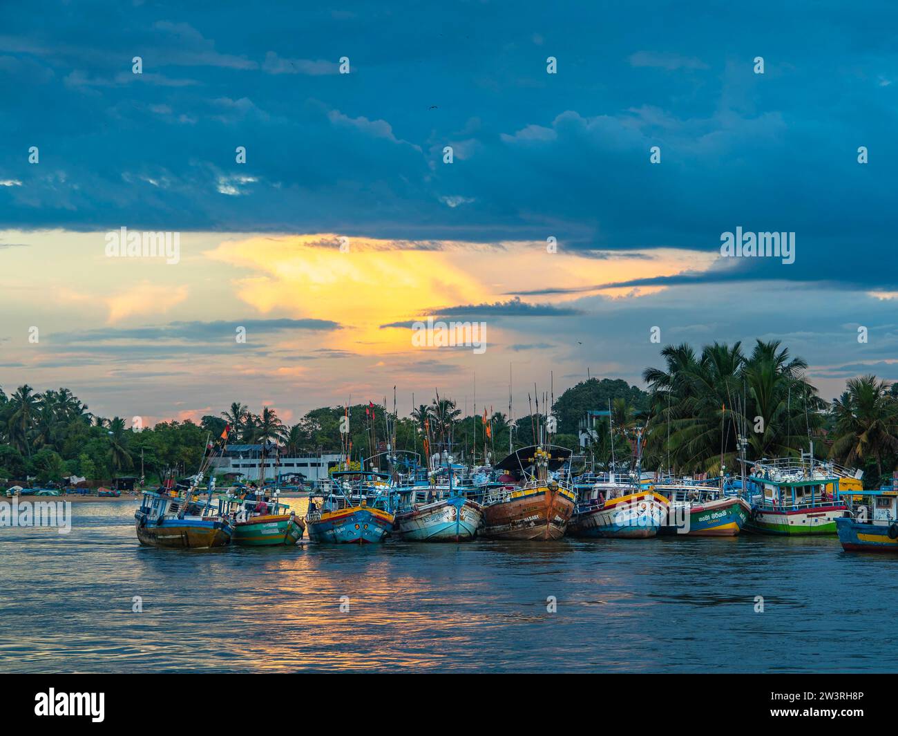 Fishing boats in lagoon, sunset, Negombo, Sri Lanka Stock Photo - Alamy