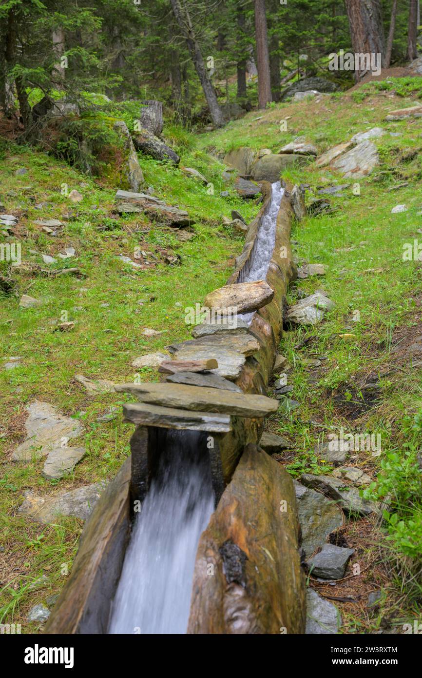 Wooden channel of the Kandelwaal, Martell, South Tyrol, Italy Stock ...