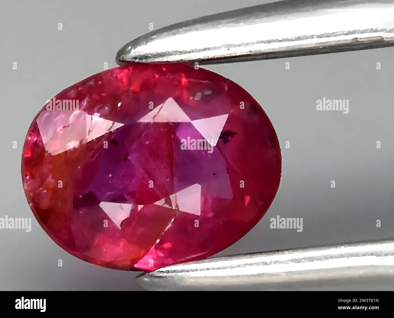 natural red ruby gem on background Stock Photo - Alamy