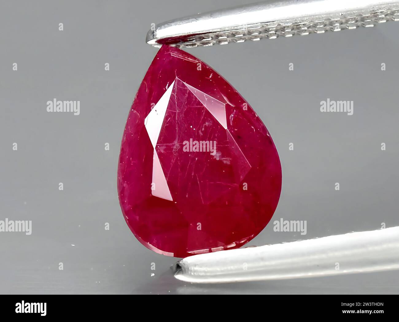 natural red ruby gem on background Stock Photo - Alamy