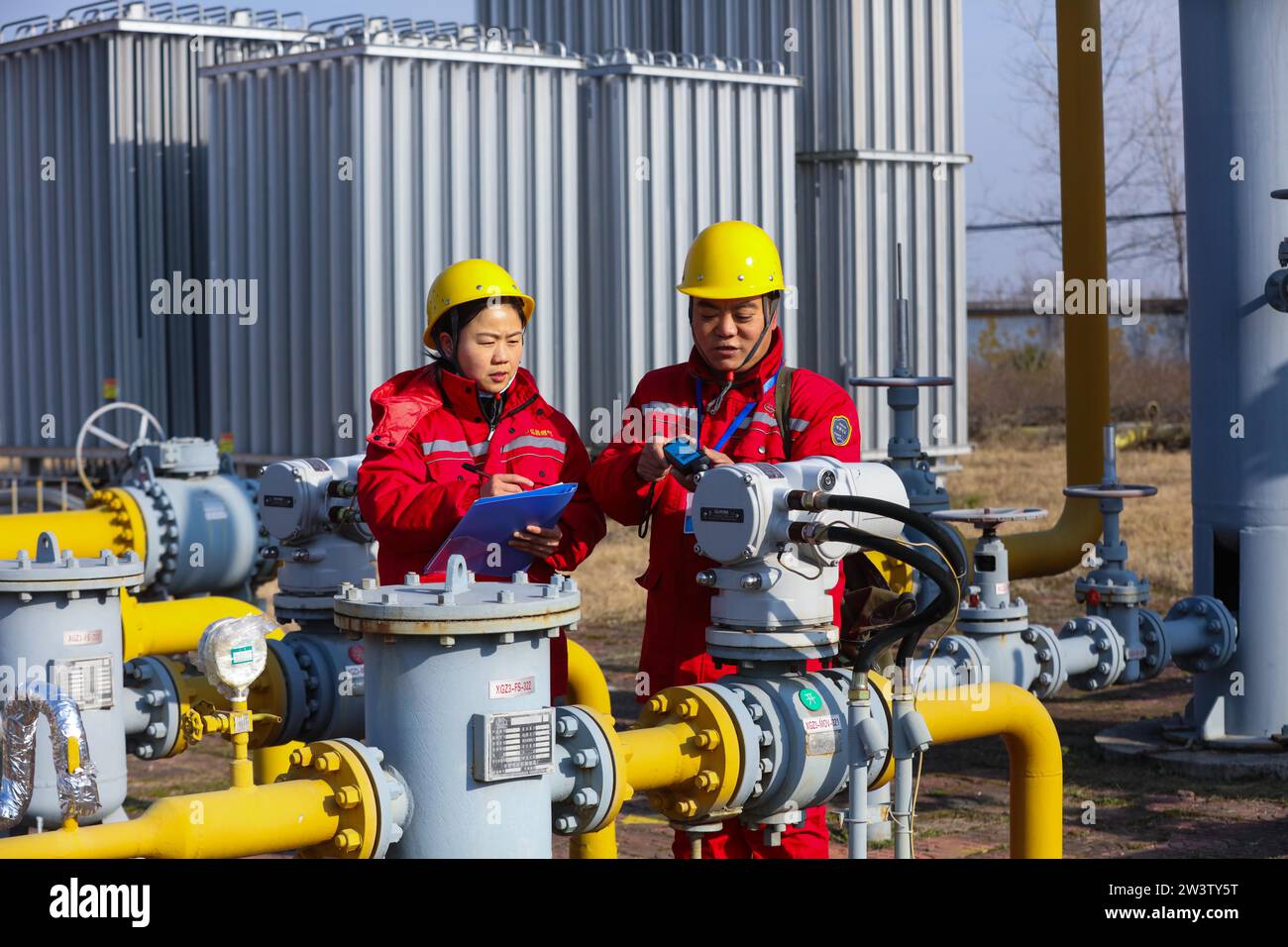 Xinyang, China's Henan Province. 21st Dec, 2023. Staff members record ...