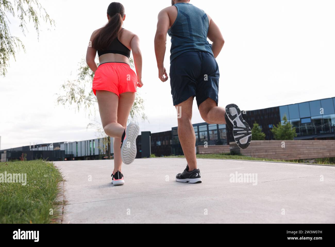 Woman run low angle feet hi-res stock photography and images - Alamy