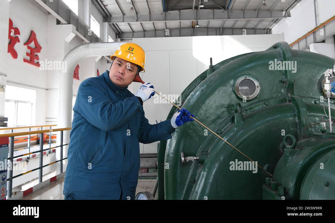 Hefei, China's Anhui Province. 21st Dec, 2023. A staff member works at ...