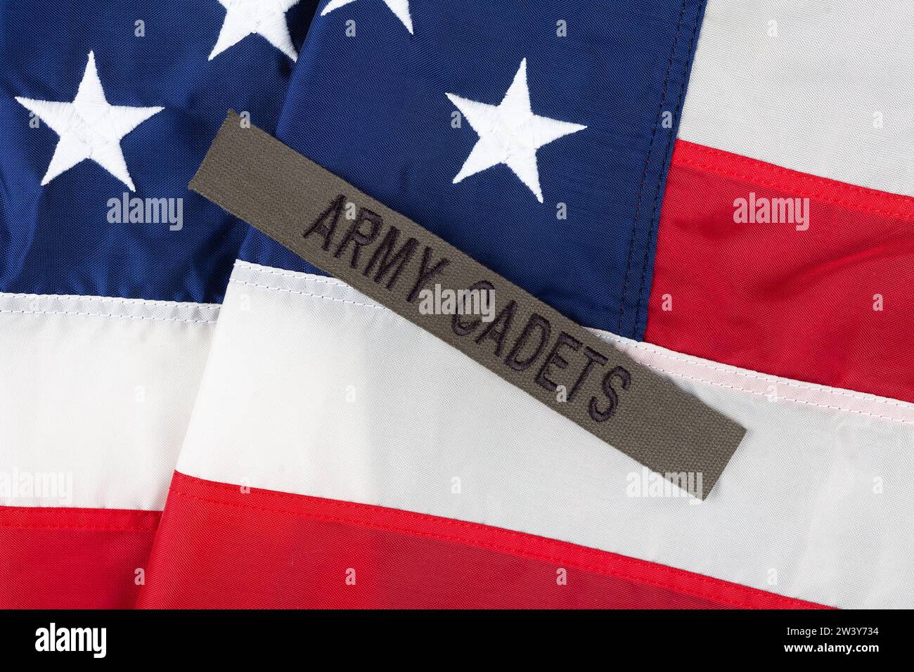 US ARMY CADETS Branch Tape on national USA flag background Stock Photo ...