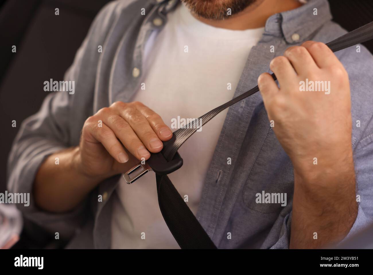 Belt pulling hi-res stock photography and images - Alamy