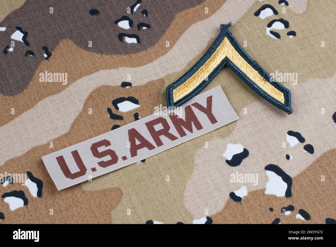 May 12, 2018. US ARMY branch tape and private rank patch on desert ...