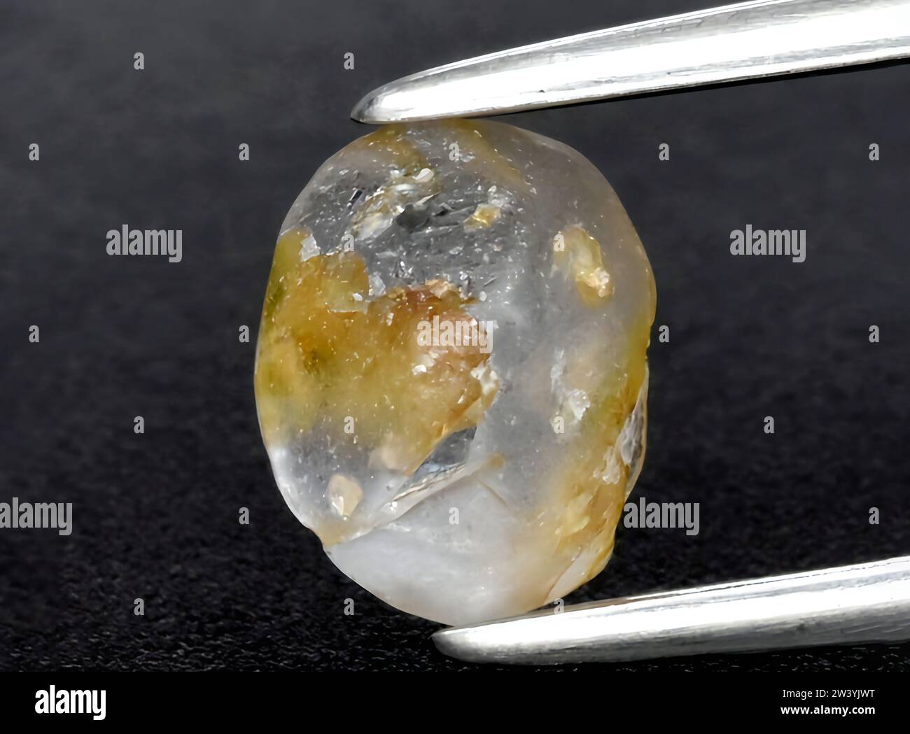 natural light pink sapphire gem on background Stock Photo - Alamy