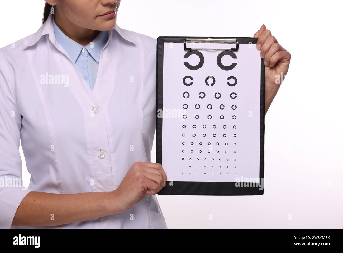 Ophthalmologist with vision test chart on white background, closeup ...