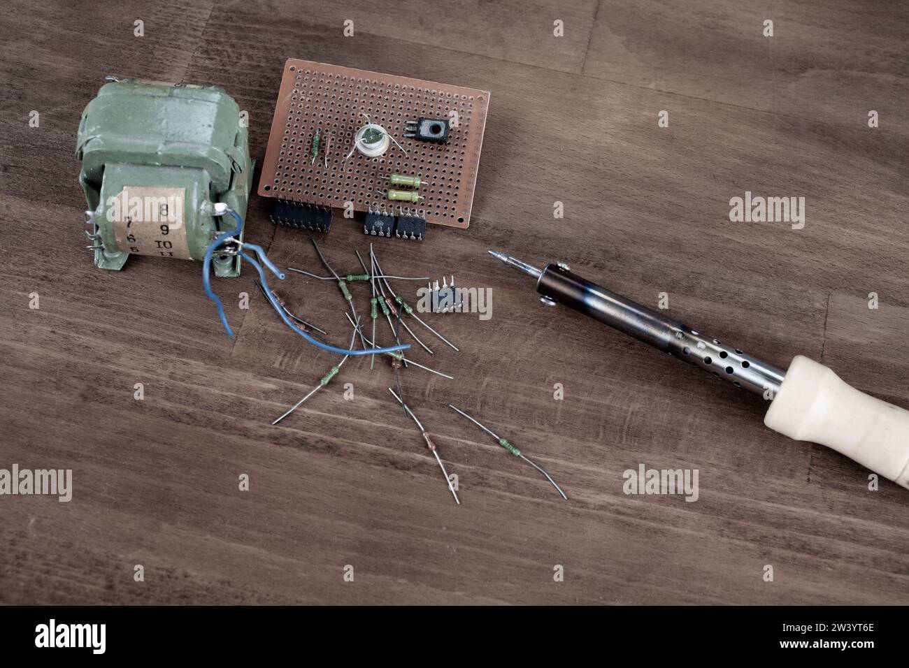 DIY. Do it yourself. Workplace with soldering iron, tools and ...