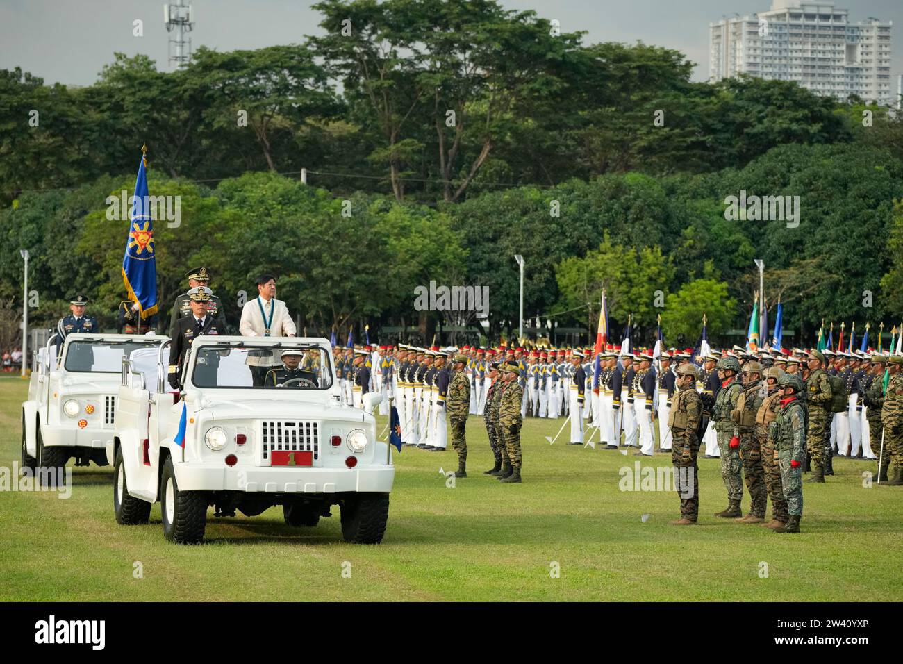 Philippines' President Ferdinand Marcos Jr., right, inspects troops ...