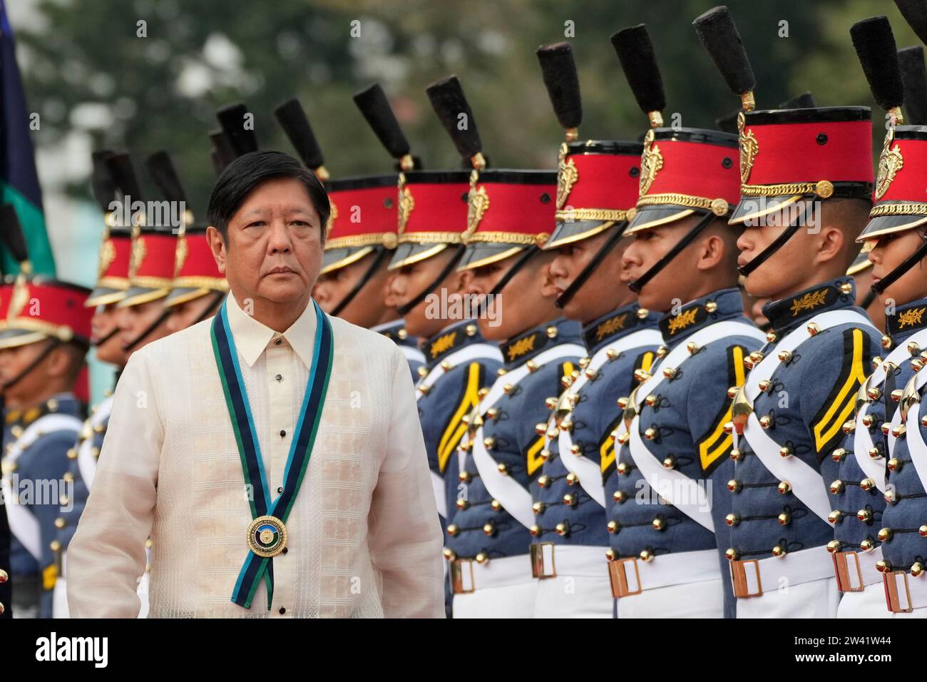 Philippines' President Ferdinand Marcos Jr. inspects troops during the ...