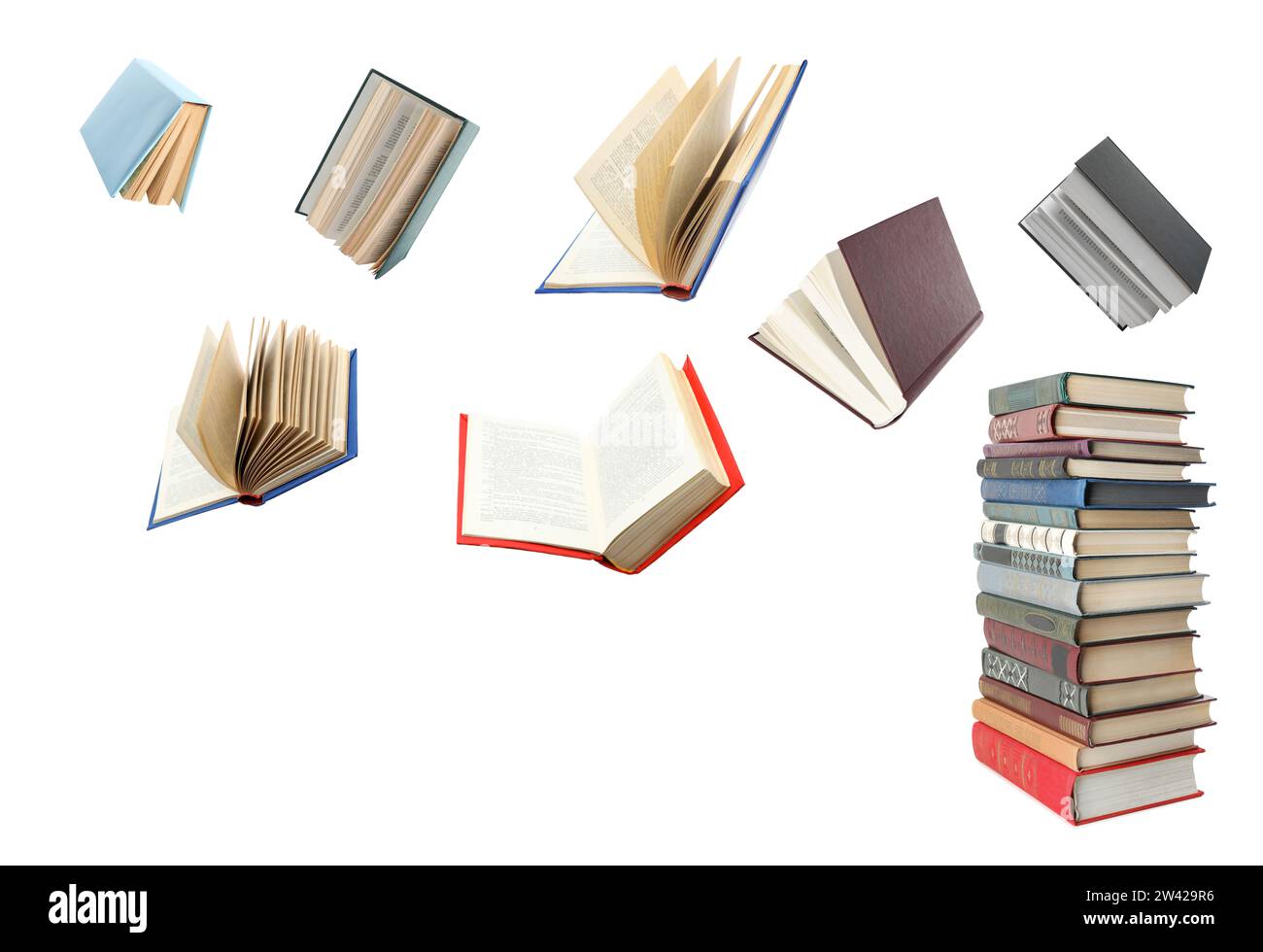 Books flying over stack on white background Stock Photo - Alamy