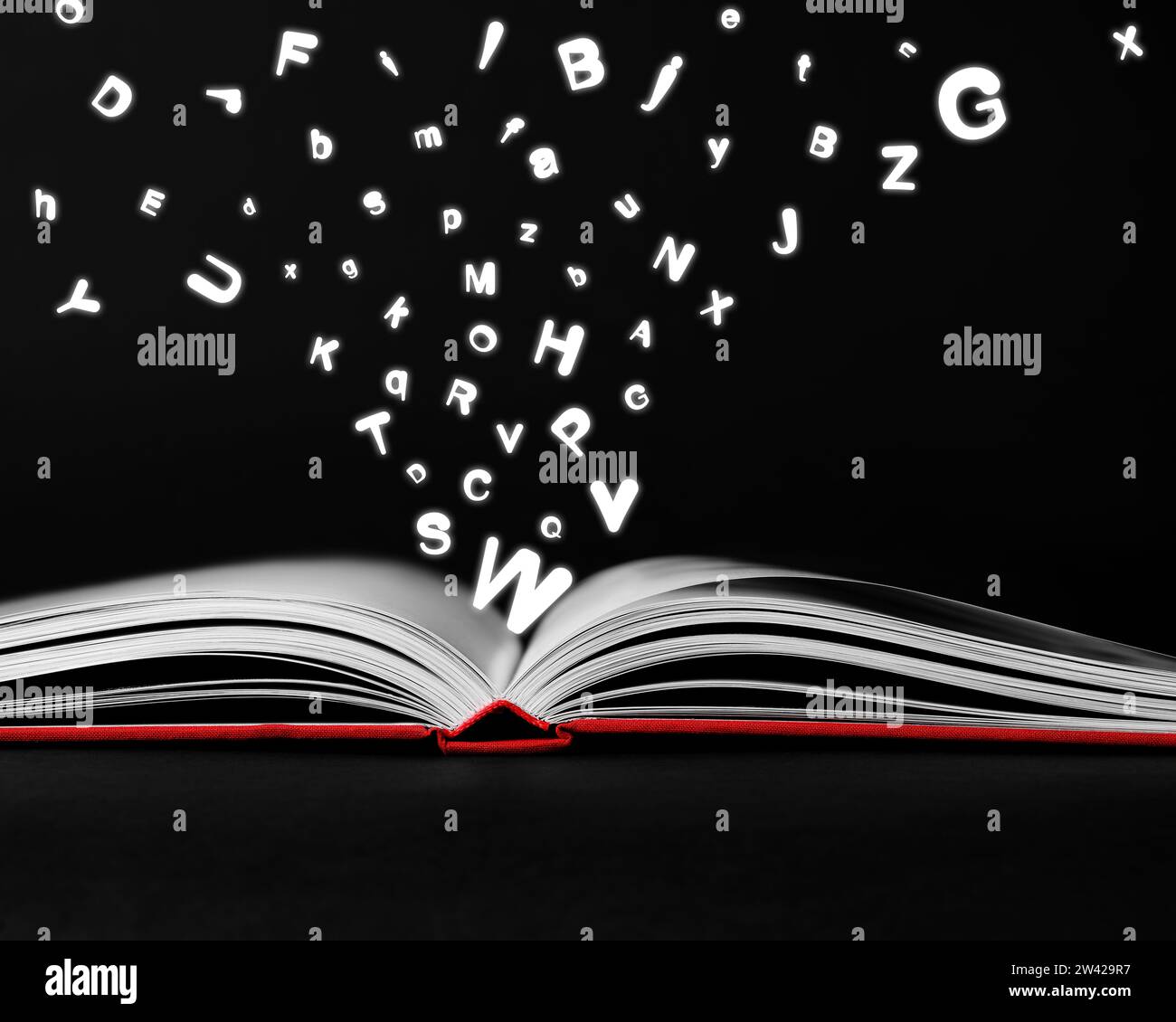 Letters flying out from open book on black background, closeup Stock ...