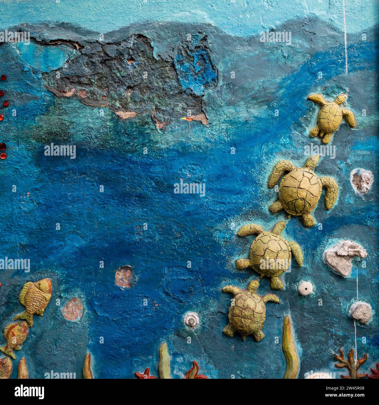 Colourful, tropical mural, capturing sea turtles swimming under the ...