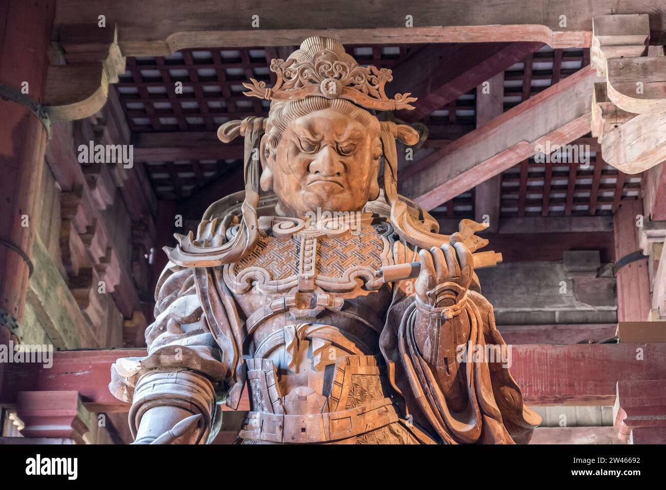 Detail of an ancient Japanese wooden statue, located in a temple in ...