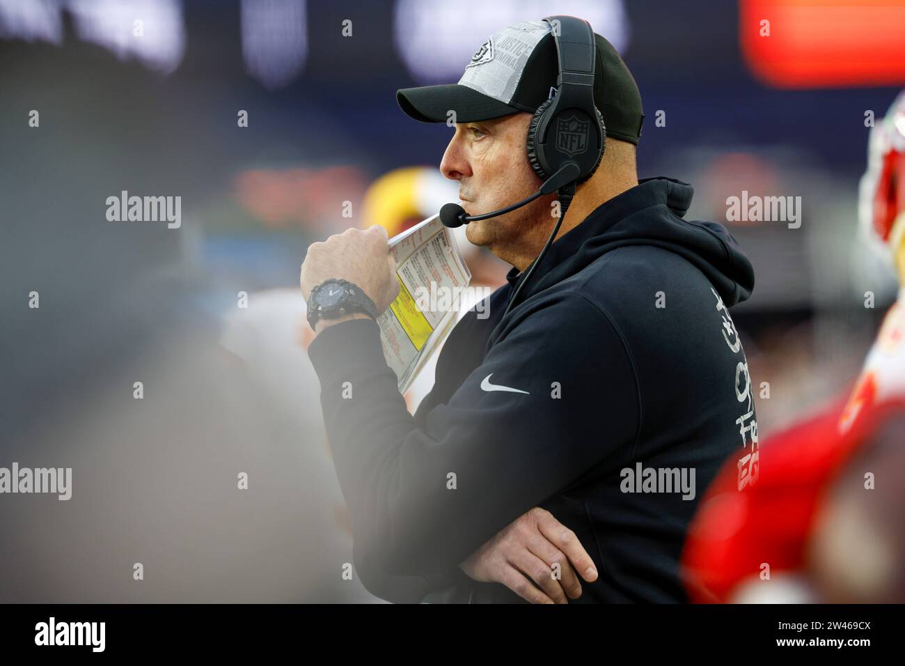 Kansas City Chiefs offensive line coach Andy Heck looks to the field ...