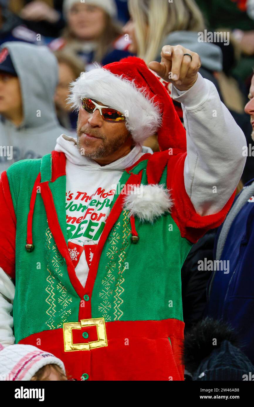 A New England Patriots fan wears a Santa outfit during the second half ...