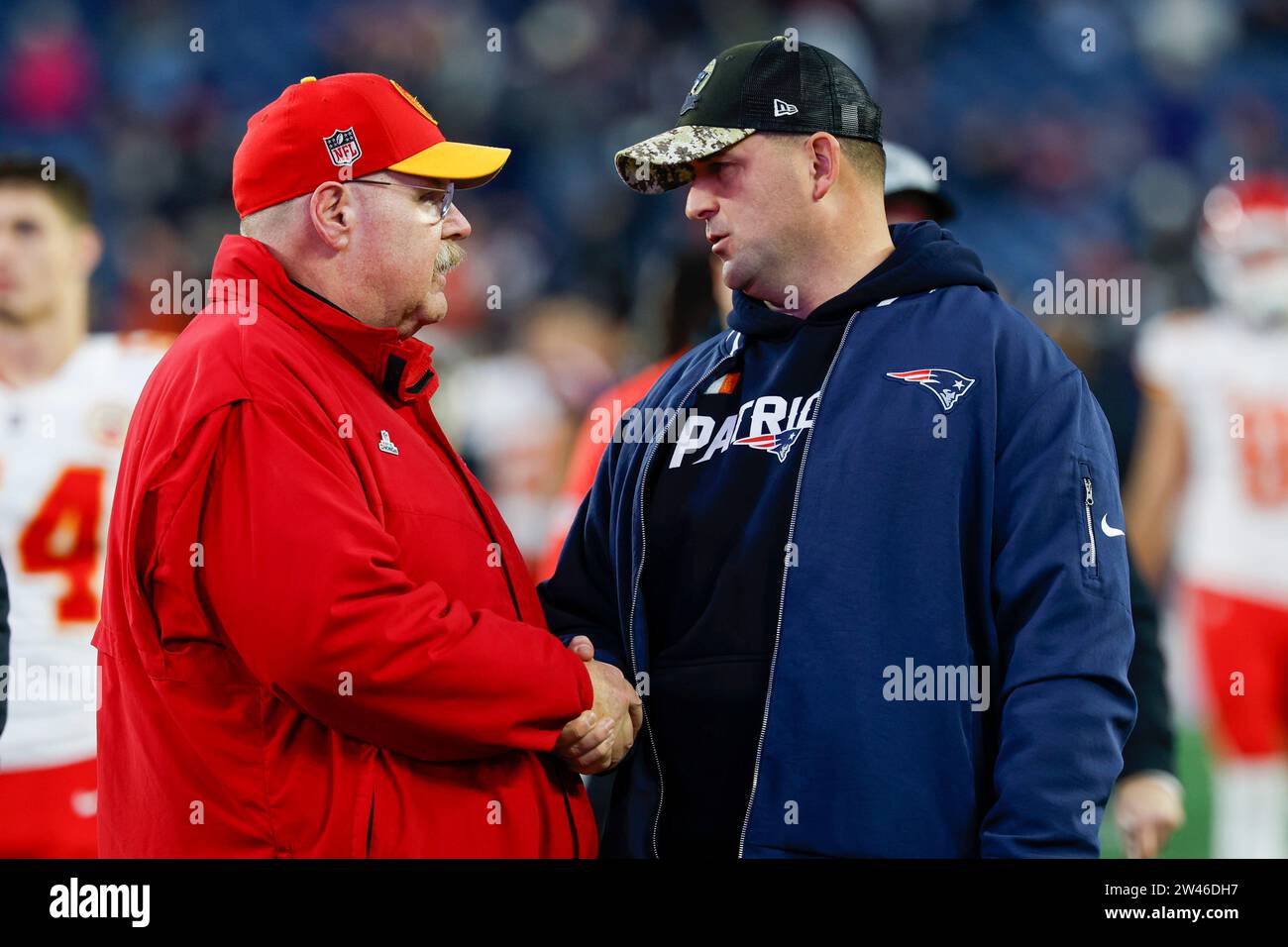 Kansas City Chiefs head coach Andy Reid talks with New England Patriots ...