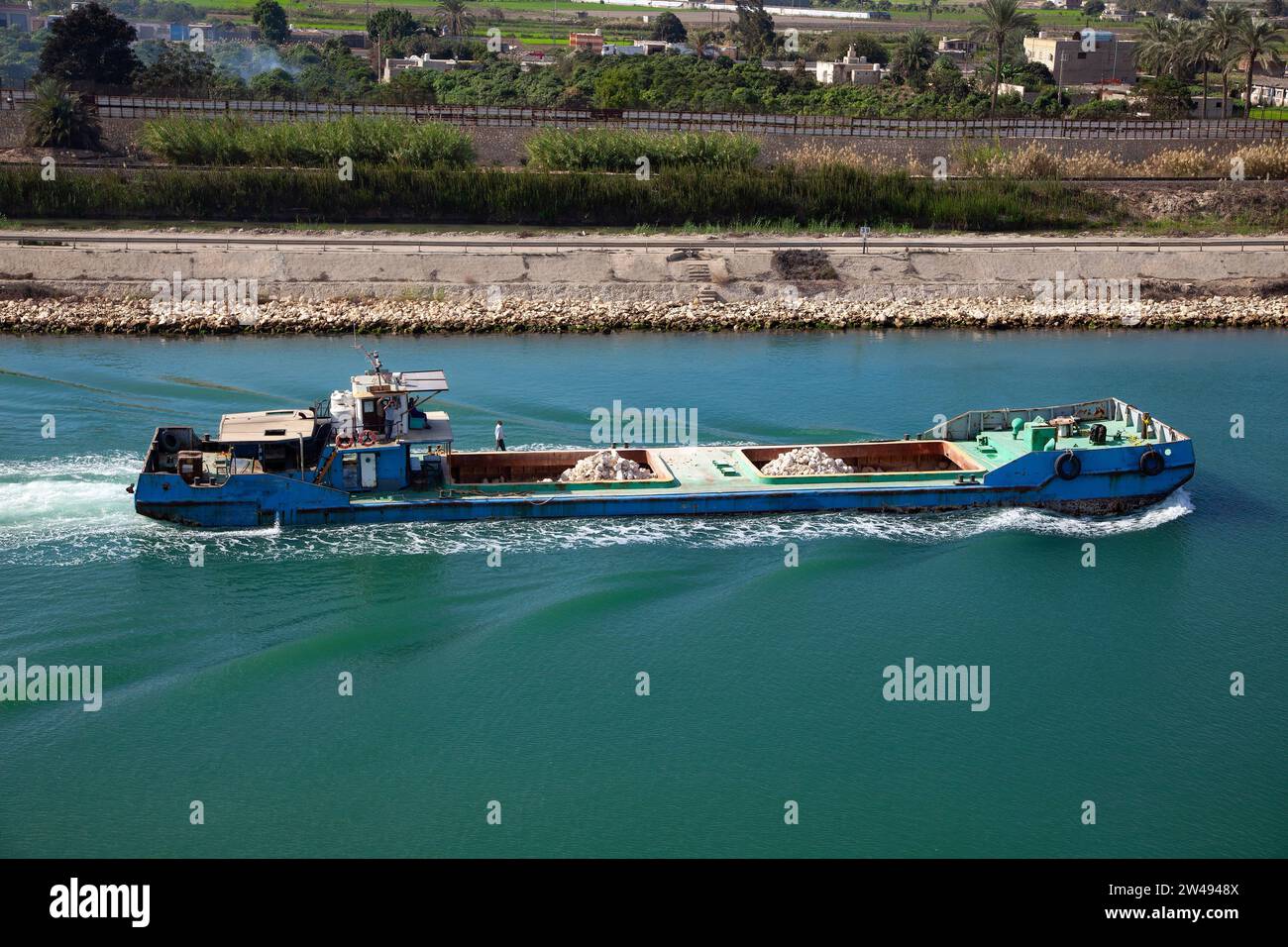 Container boat in Suez canal Stock Photo - Alamy
