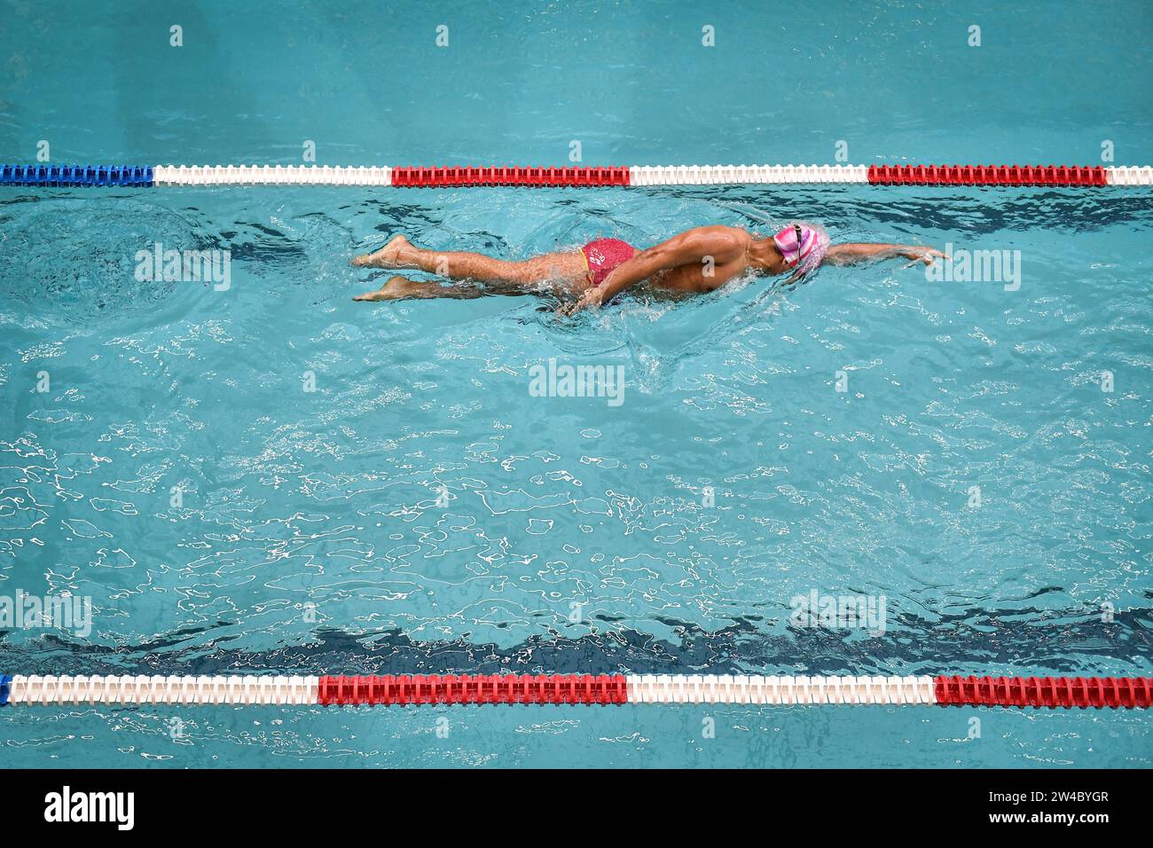 Paris, France. 21st Dec, 2023. A swimmer performs at the newly ...