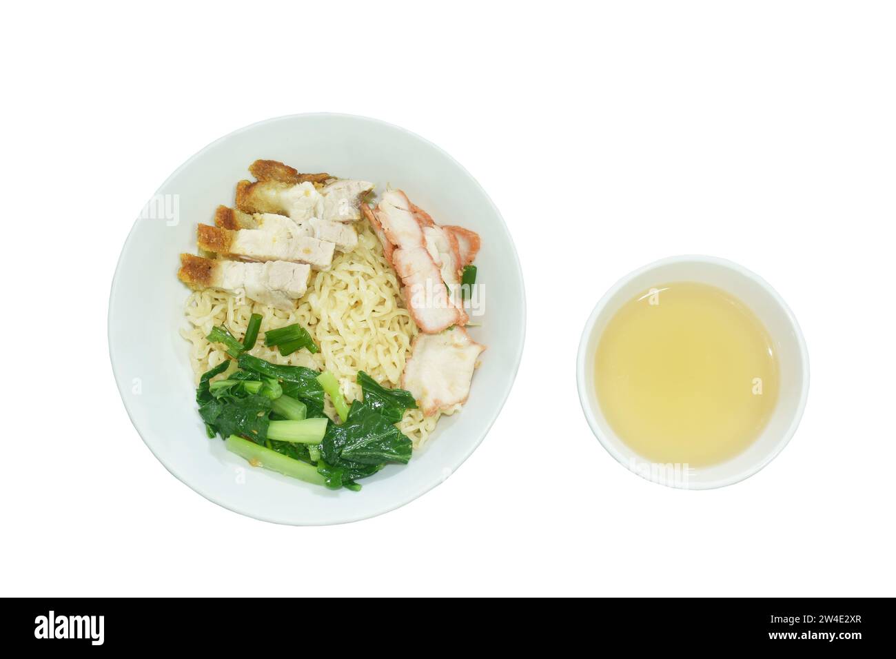 dry Chinese yellow egg noodles topping slice crispy and barbecue pork ...