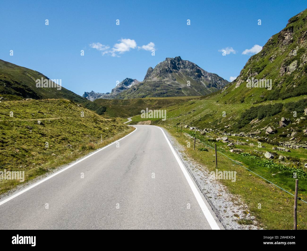 Deserted winding alpine road hi-res stock photography and images - Alamy