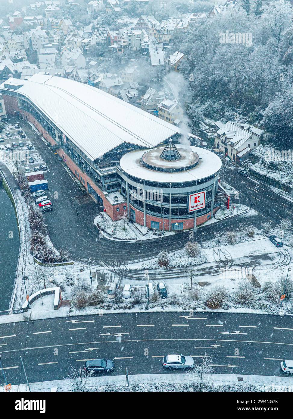 Aerial view of a shopping centre in a snow-covered urban area, Black ...