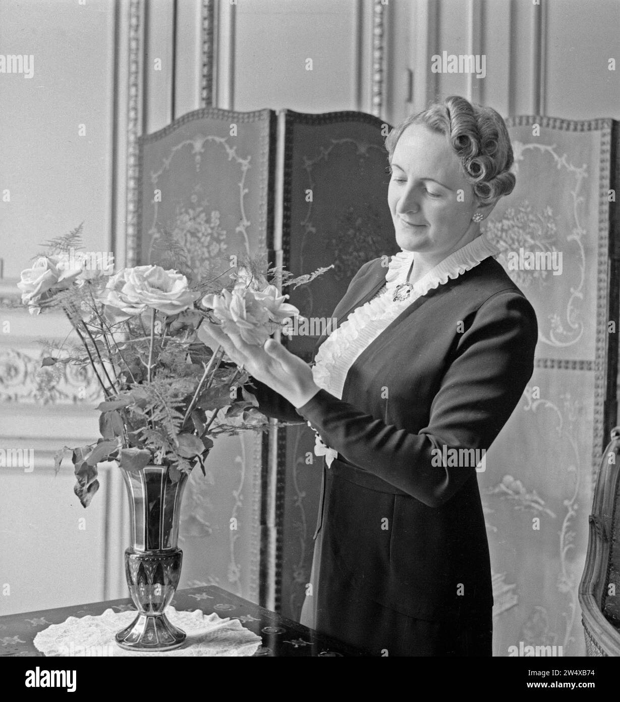 Pavla Vachková-Osusky, wife of diplomat Štefan Osusky, posing by a vase ...