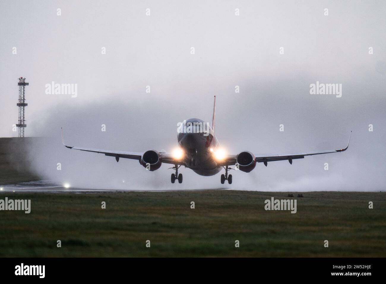 A aircraft taking off from Leeds Bradford Airport during Storm Pia ...