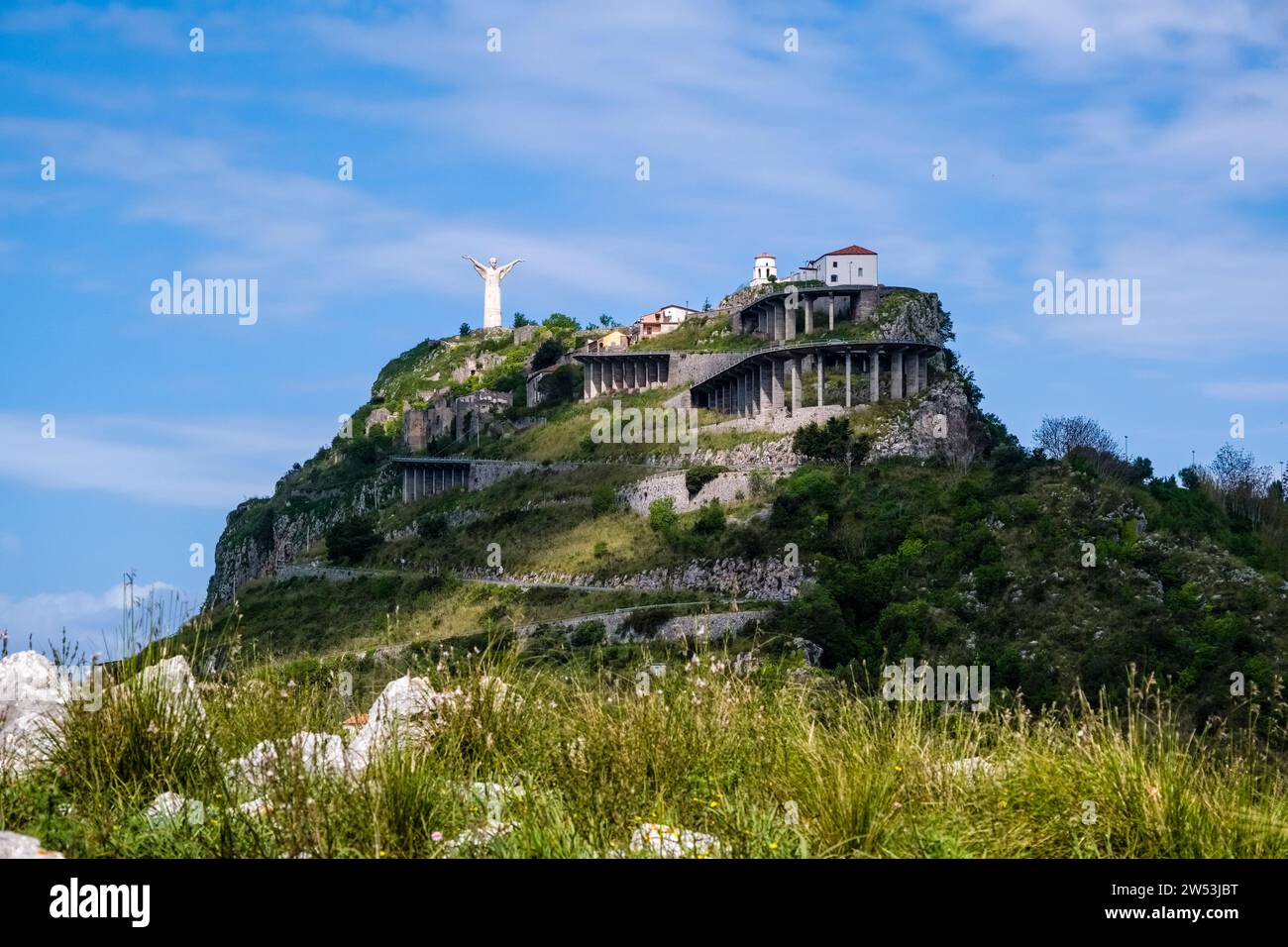 The summit of the mountain Monte San Biagio with the Statue of Christ ...