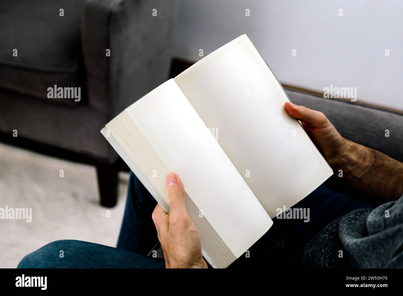 Man reading a book. Ideal photo of blank pages book ready for mockup ...