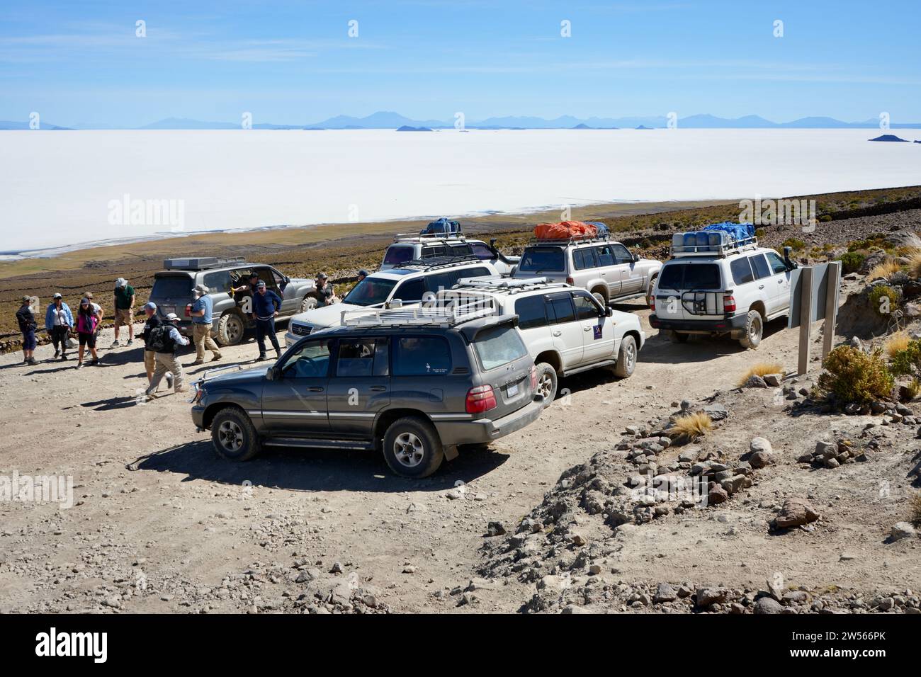 Tourist 4x4s waiting to cross the salt flats. Coqueza Canton, Bolivia ...
