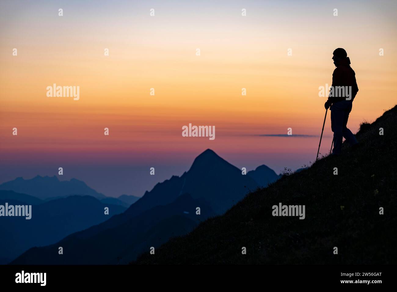 Mountaineer on mountain ridge with Rothorn peak in the background at ...