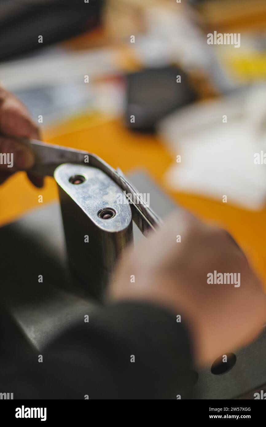 Unrecognizable luthier lute maker artisan hands in his workshop ...