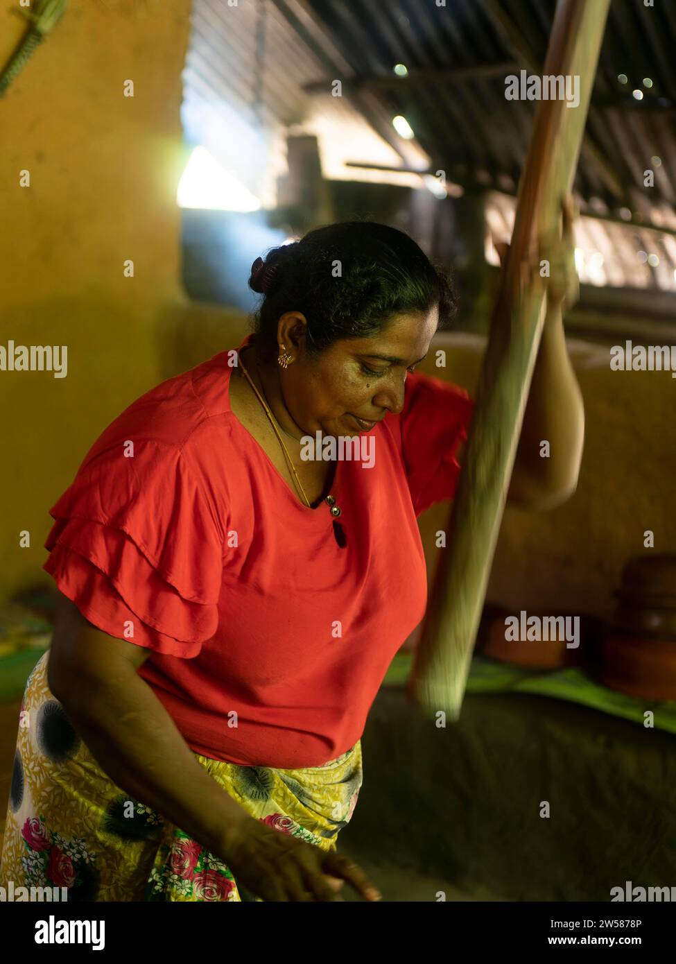 Pounding rice hi-res stock photography and images - Alamy