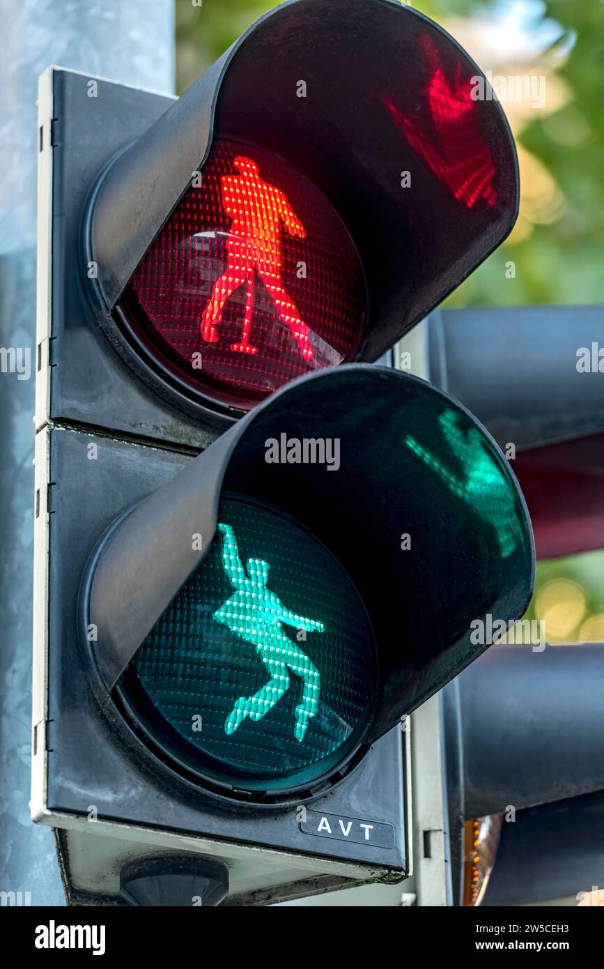 Traffic light man, red and green illuminated pictogram of rock 'n' roll ...