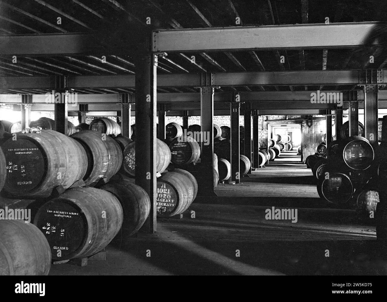 Storage of barrels of whiskey in the attic ca. 1934 Stock Photo - Alamy