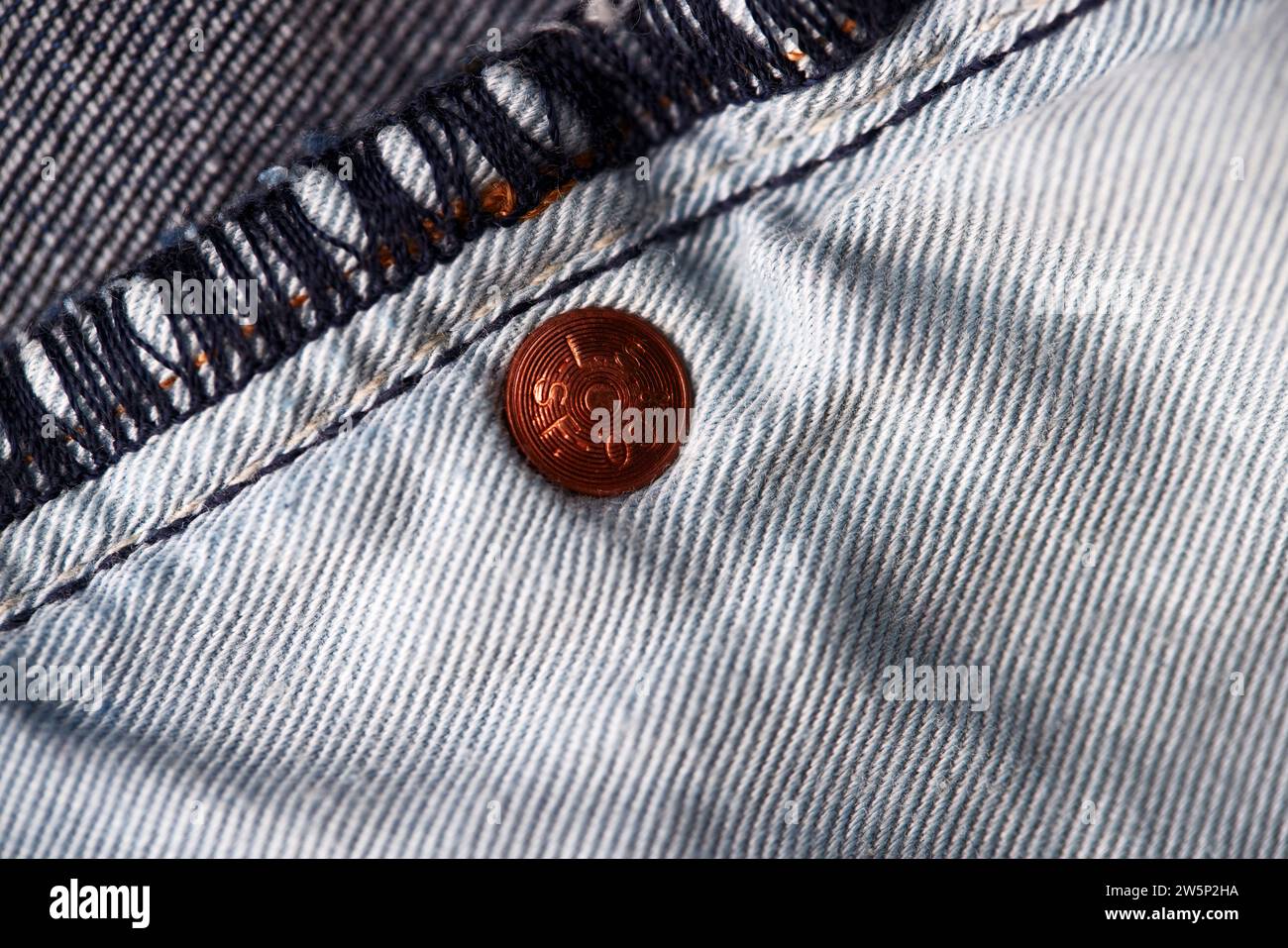 Seams on LEVI'S jeans close-up. Stitching on denim on the inside ...