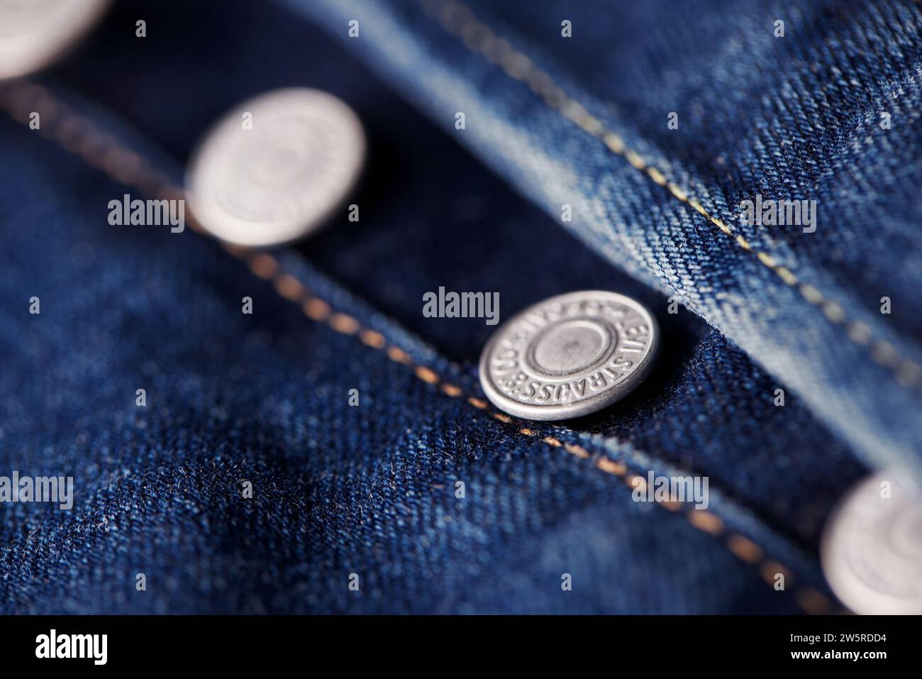 Close up of the details of new LEVI'S 501 Jeans. Seams and button fly ...
