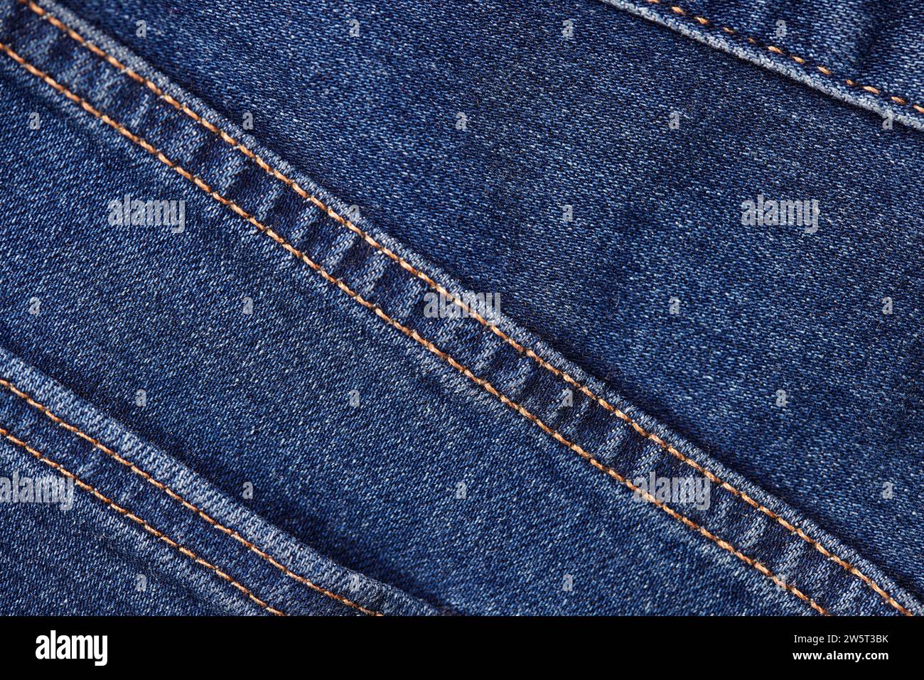 Seams on jeans close-up. Stitching on denim. Fabric texture. Blue jeans ...