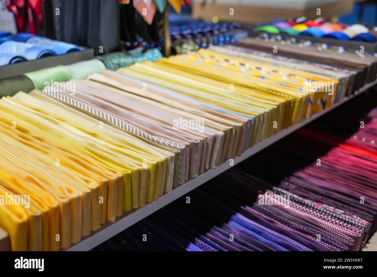 Many different ties of multi colors yellow gradient assortment display ...