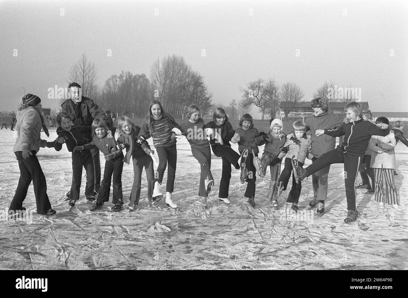 Children having fun ice skating ca. January 1, 1973 Stock Photo - Alamy