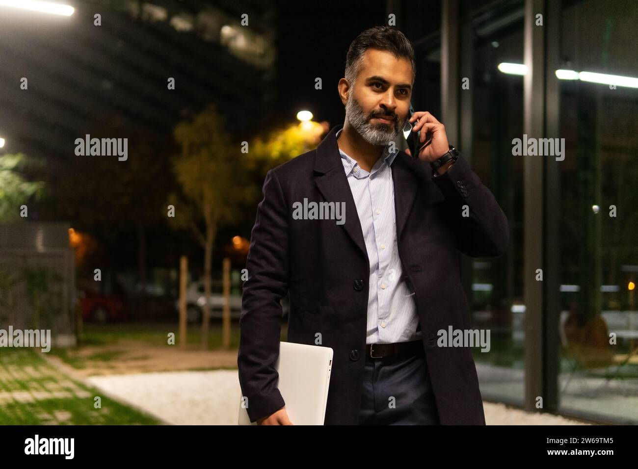 Indian man using smartphone after hi-res stock photography and images ...