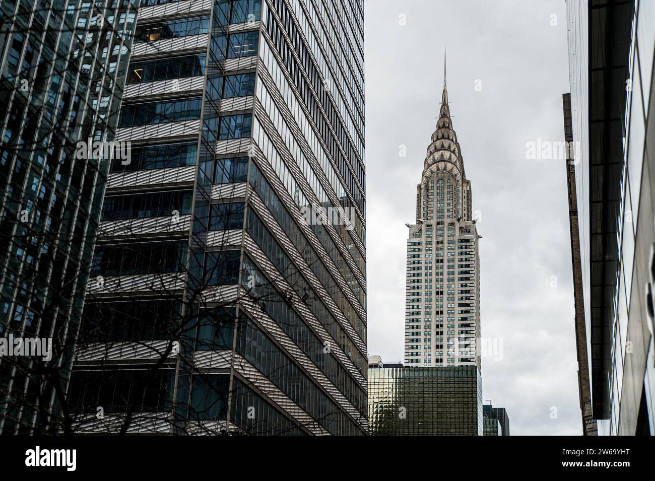 Low angle of high multistory buildings and Chrysler building located in ...