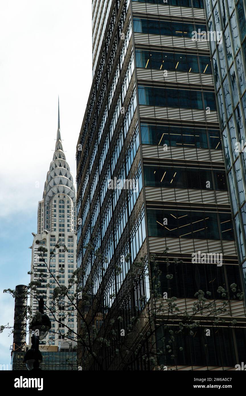 Low angle of high multistory buildings and Chrysler building located in ...