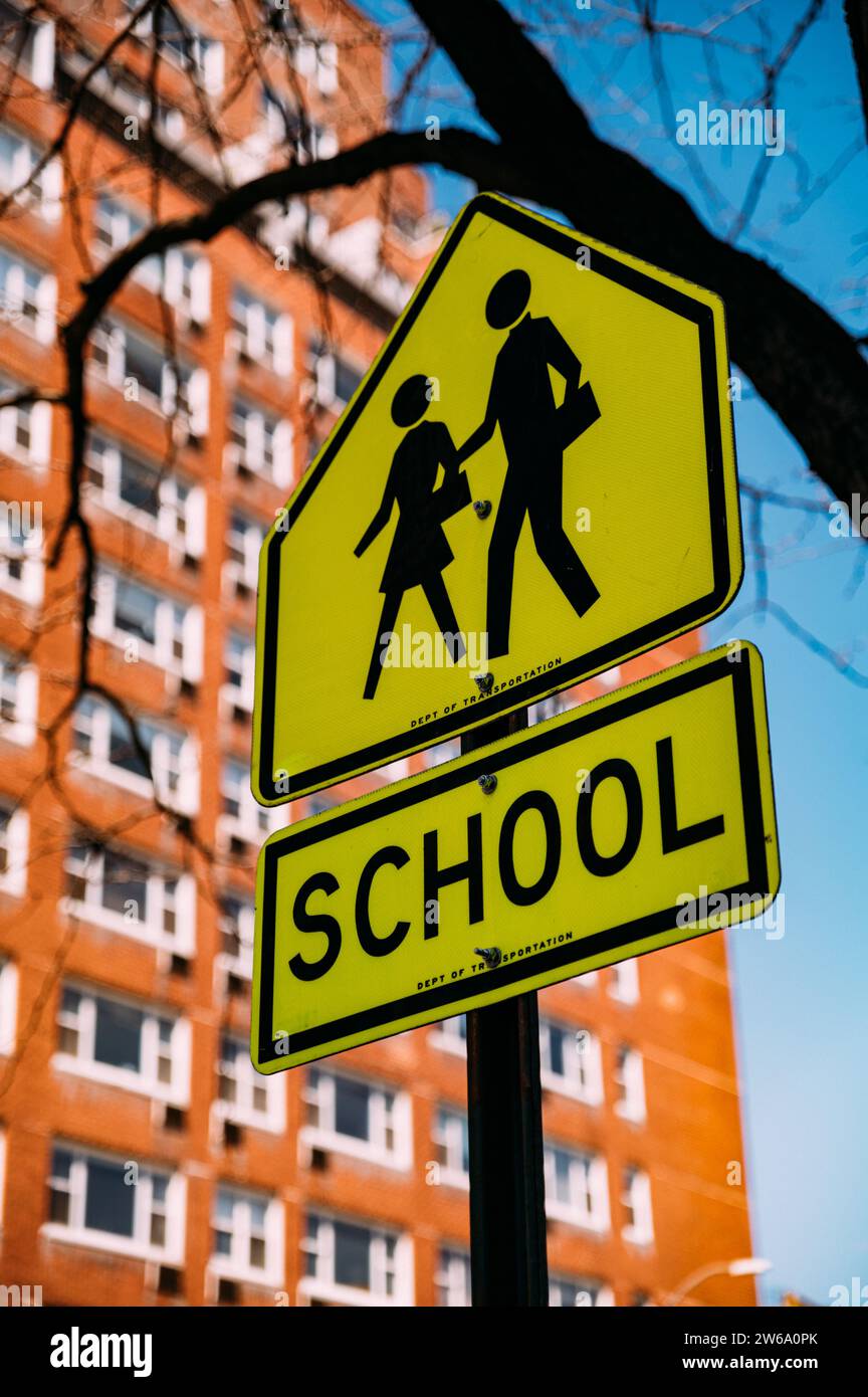 Low angle of school pedestrian crosswalk street sign on Manhattan ...