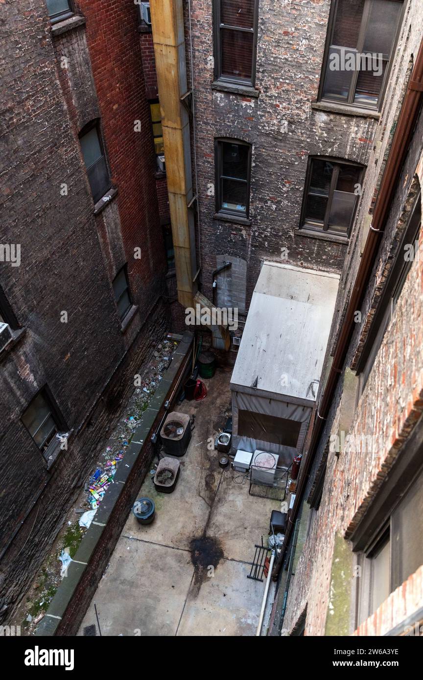 An overhead view of a cluttered backyard in Manhattan with scattered ...