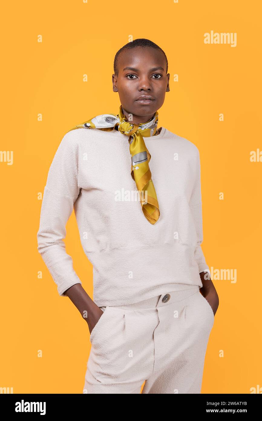 Confident African American slim young woman in fashionable casual ...