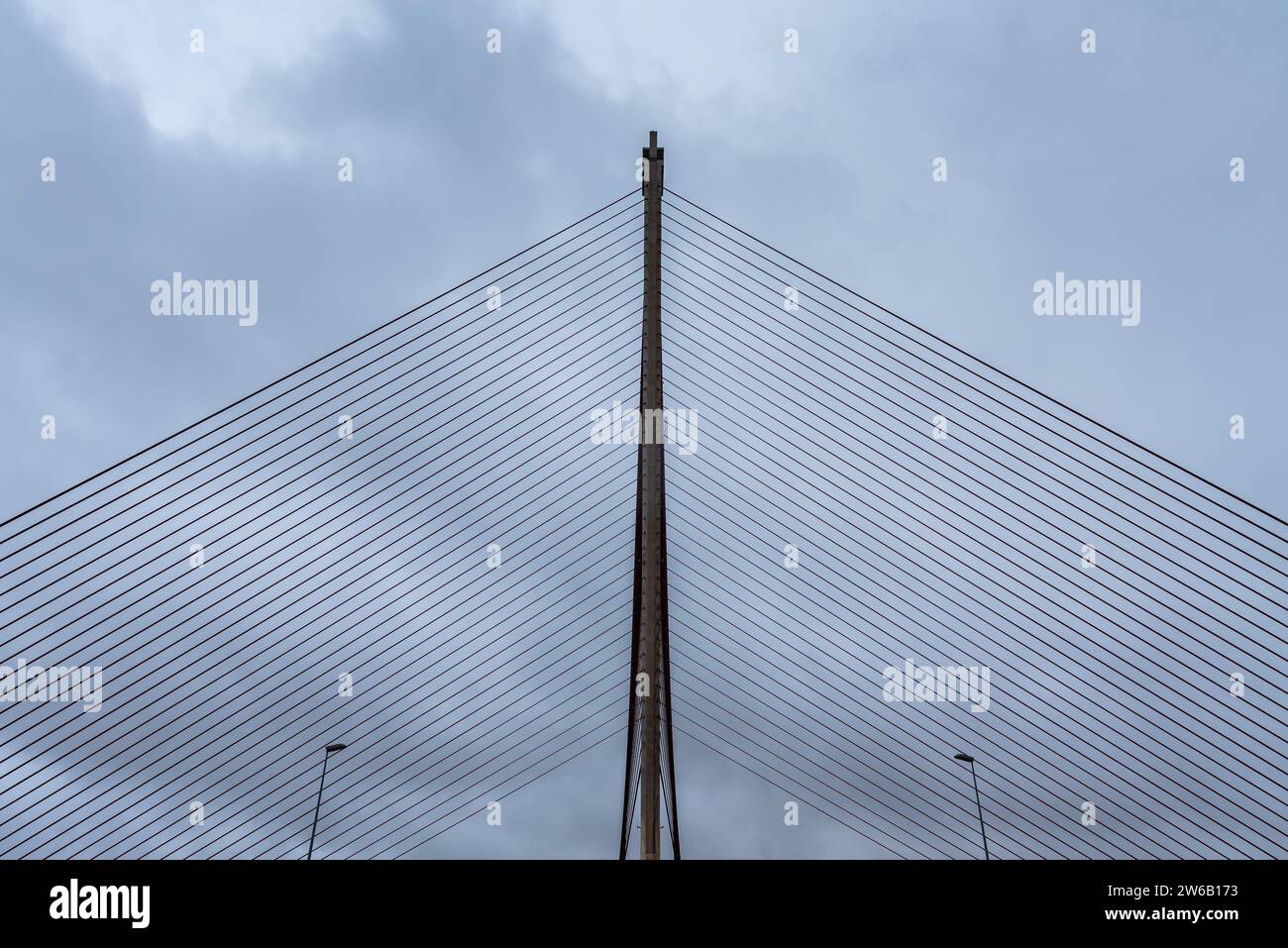 An architectural close-up of a cable-stayed bridge showing the symmetry ...