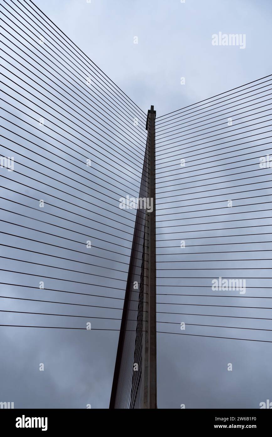 An architectural close-up of a cable-stayed bridge showing the symmetry ...